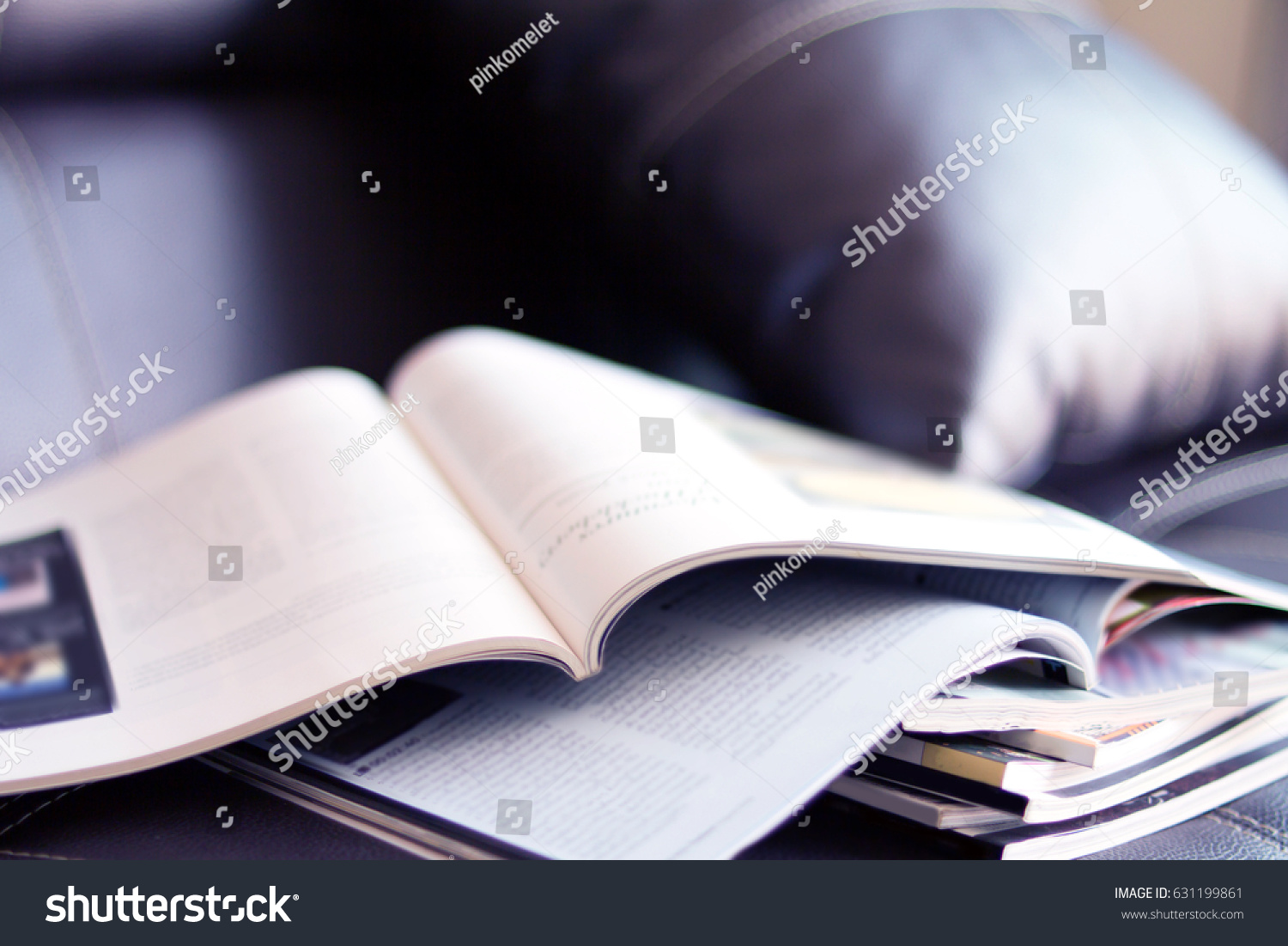 stock-photo-selective-focus-of-the-stacking-magazine-place-on-table-in ...
